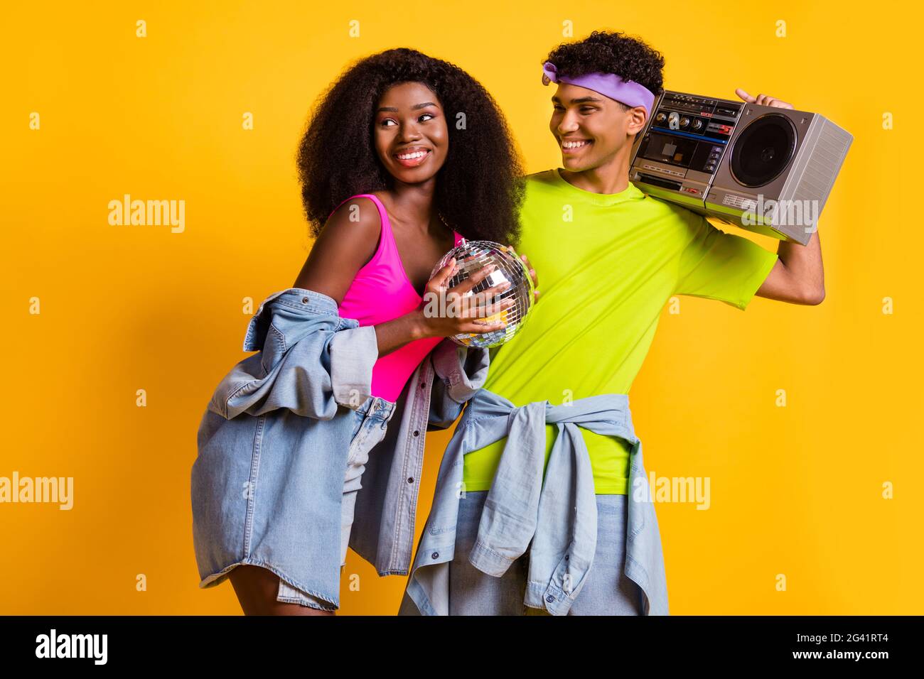 Portrait of attractive cheerful funky couple embracing having fun ...