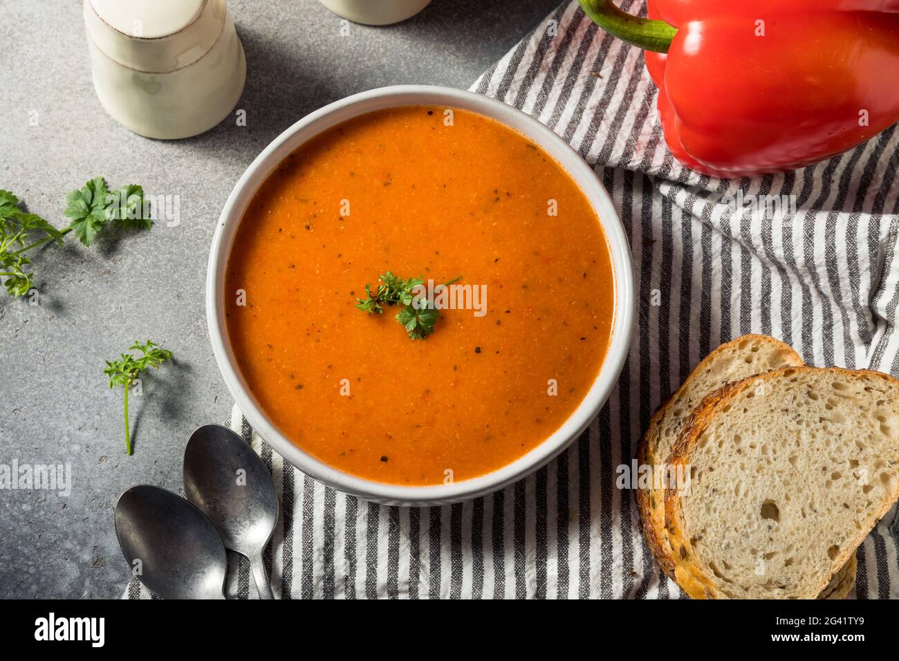 Healthy Homemade Red Bell Pepper Soup with Bread Stock Photo - Alamy