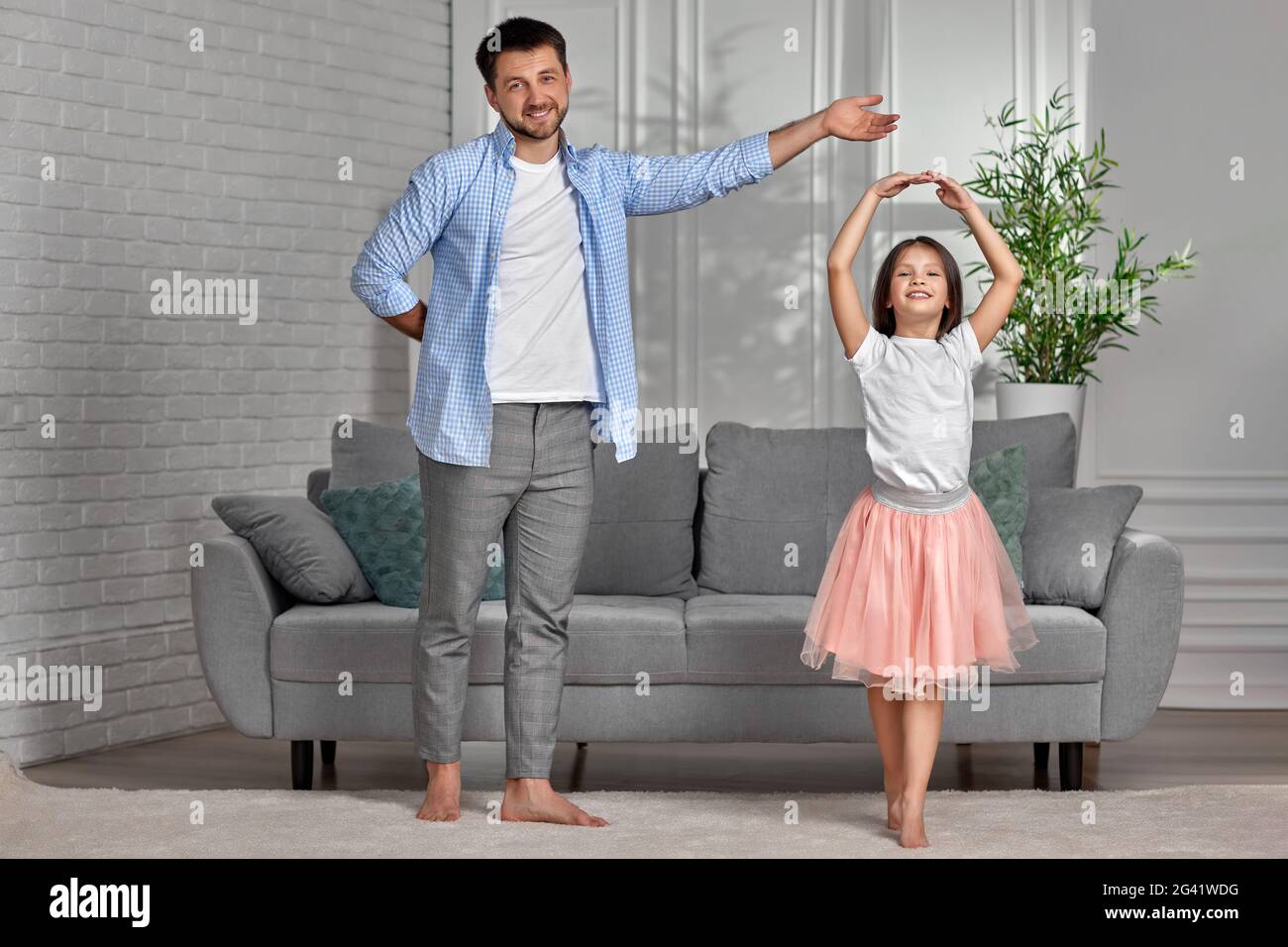 father dancing with his little cute daughter at home Stock Photo - Alamy