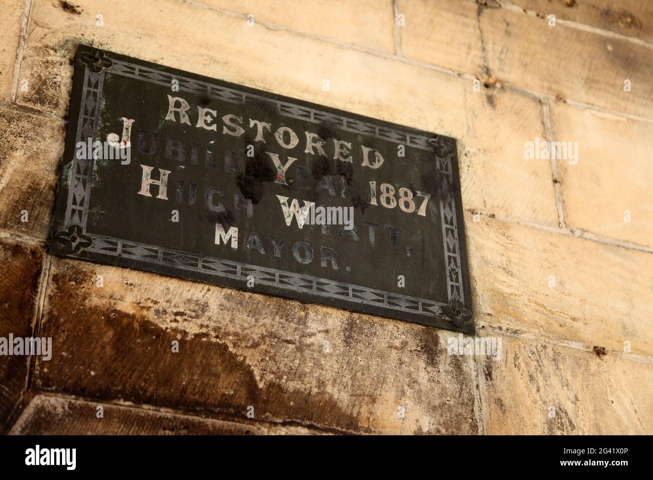 Sign in the Guildhall and Stonebow, Lincoln, UK, commemorating its 1887 ...