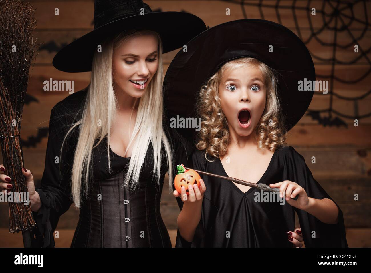 Halloween Concept - beautiful caucasian mother and her daughter in ...
