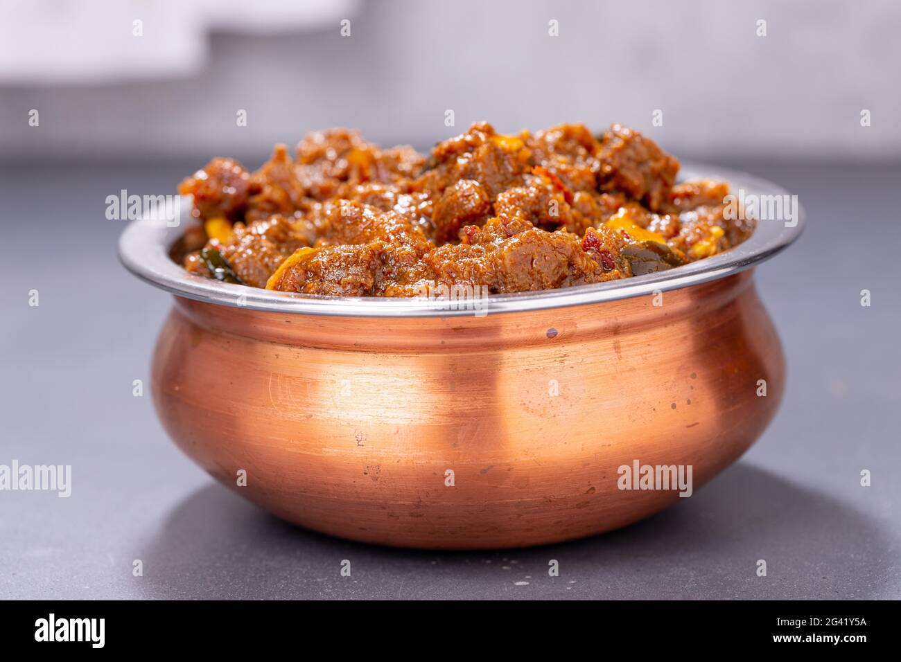 Beef roast or pothu ulartheyadu, kerala special dish arranged in ...