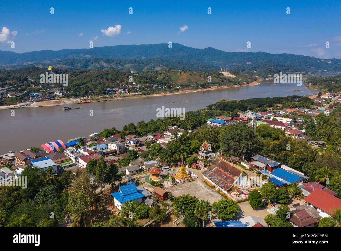 Aerial view of Vat Chom Khao Manilat Temple with Mekong River behind, Huoayxay (Huay Xai), Bokeo ...