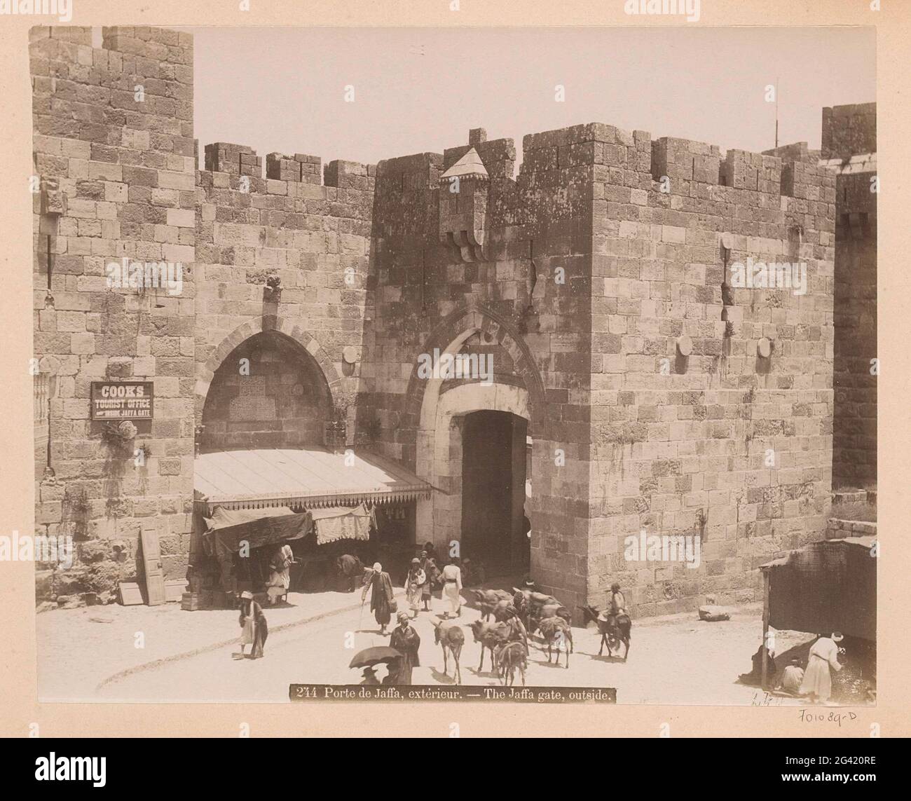Donkeys and passers-by at the jaffap port in Jerusalem; Porte de Jaffa ...
