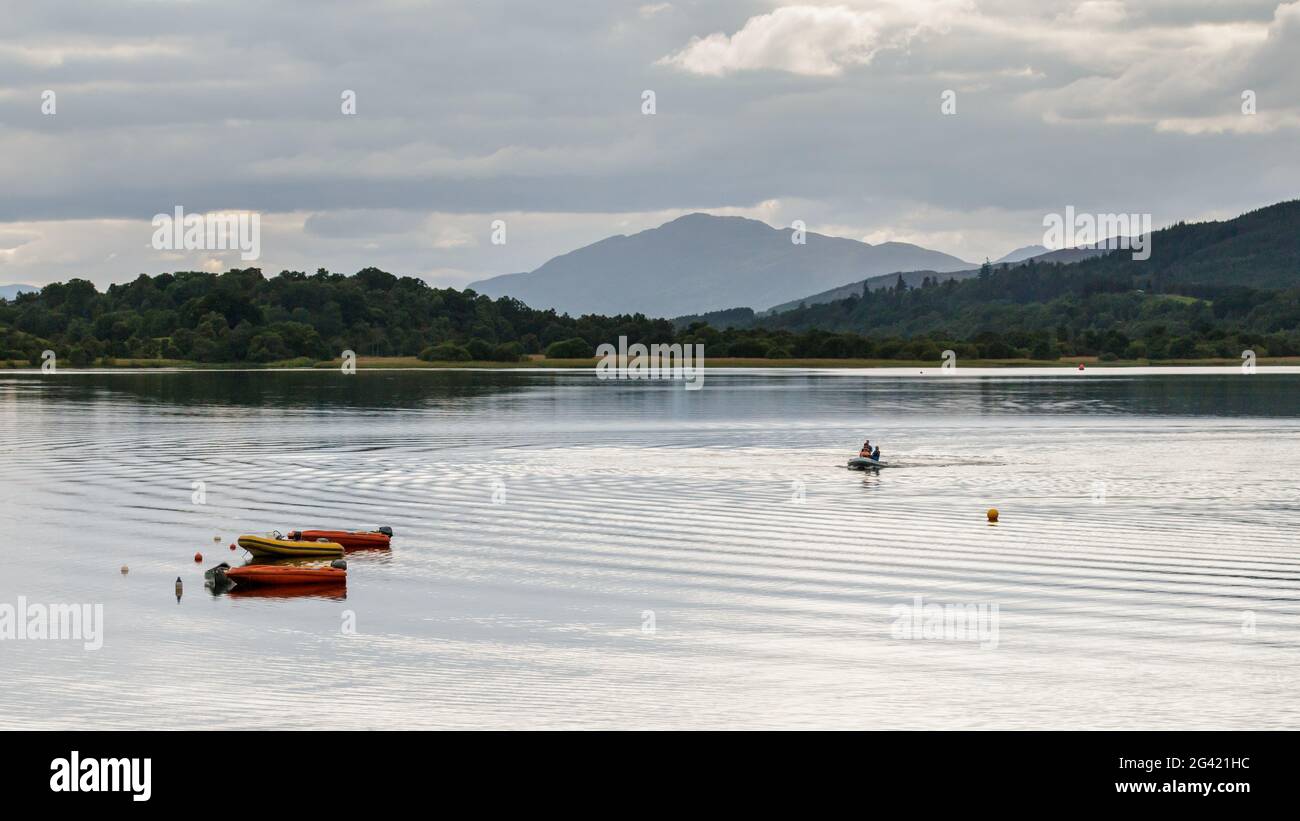 Boats on Loch Insh Stock Photo - Alamy