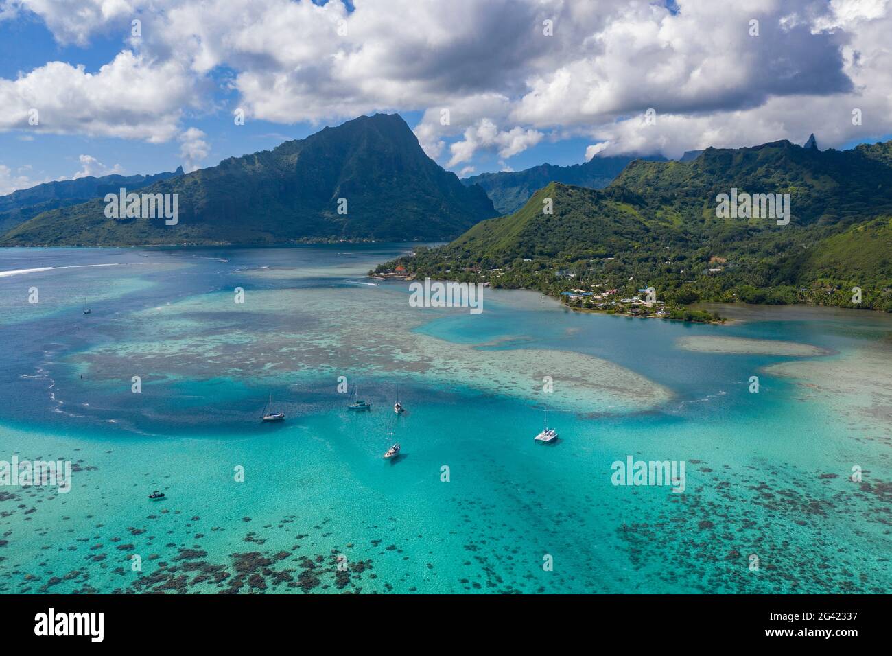 Aerial view of moored sailboats in the Moorea Lagoon, Apootaata, Moorea ...