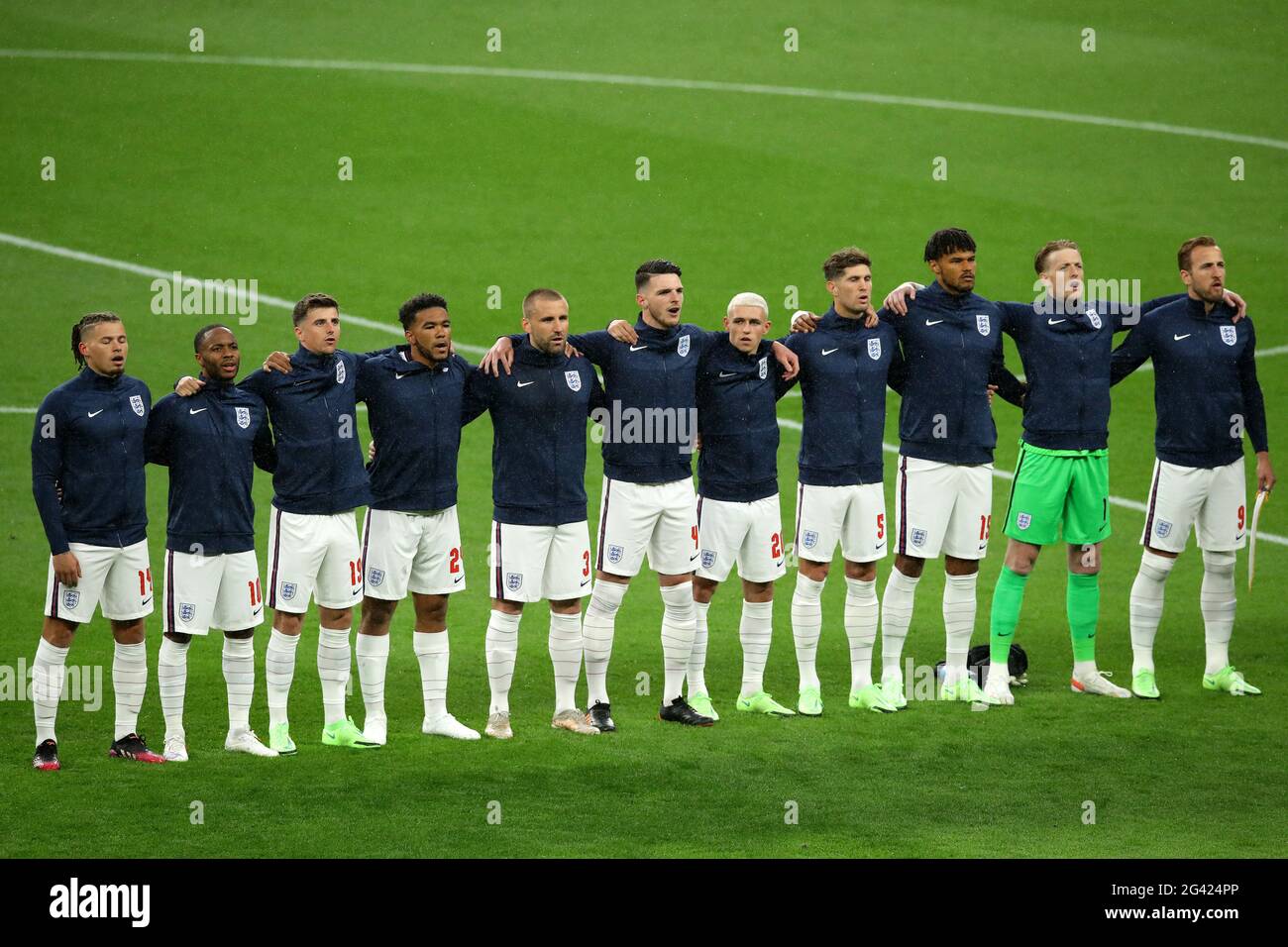 London, UK. 18th June 2021. The England team sing the National Anthem ...