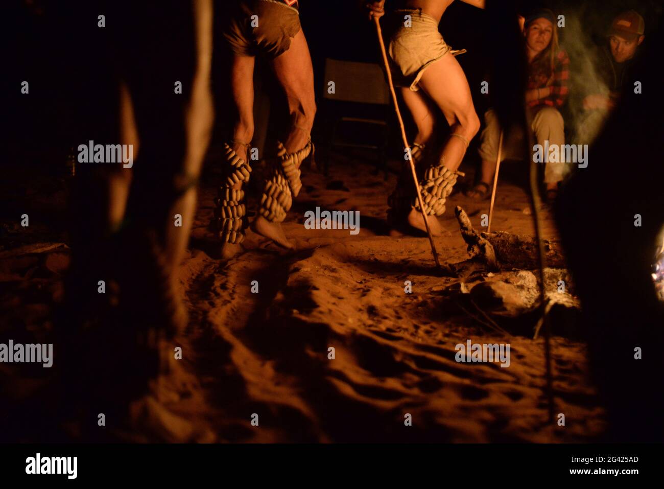 Bushmen Naro Tribe enjoying their traditional dance around a fire at ...