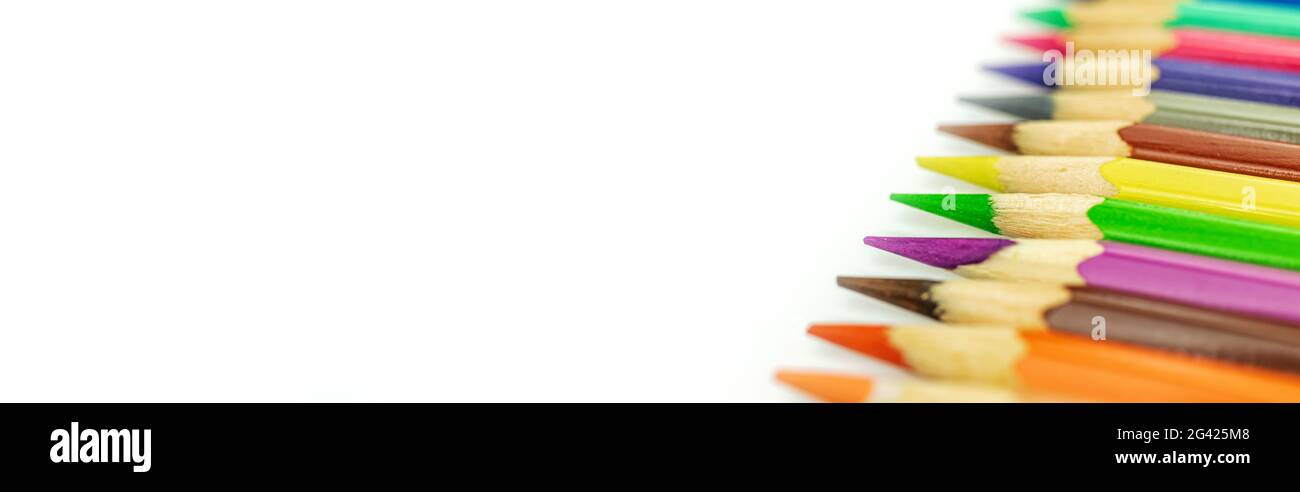 Long banner with color pencils on a isolated white background, copy ...