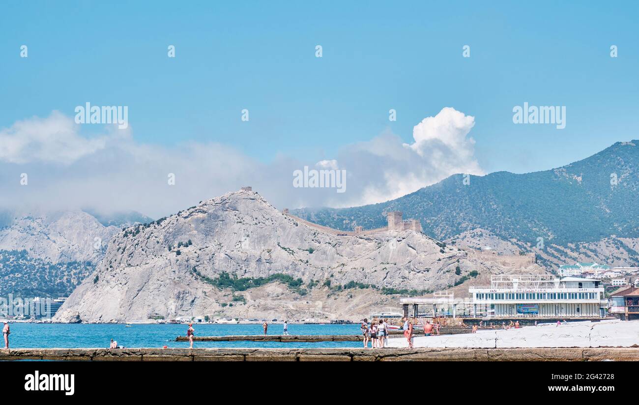 Sudak, Ukraine - June 13, 2021: View of coast, walls and towers of ...