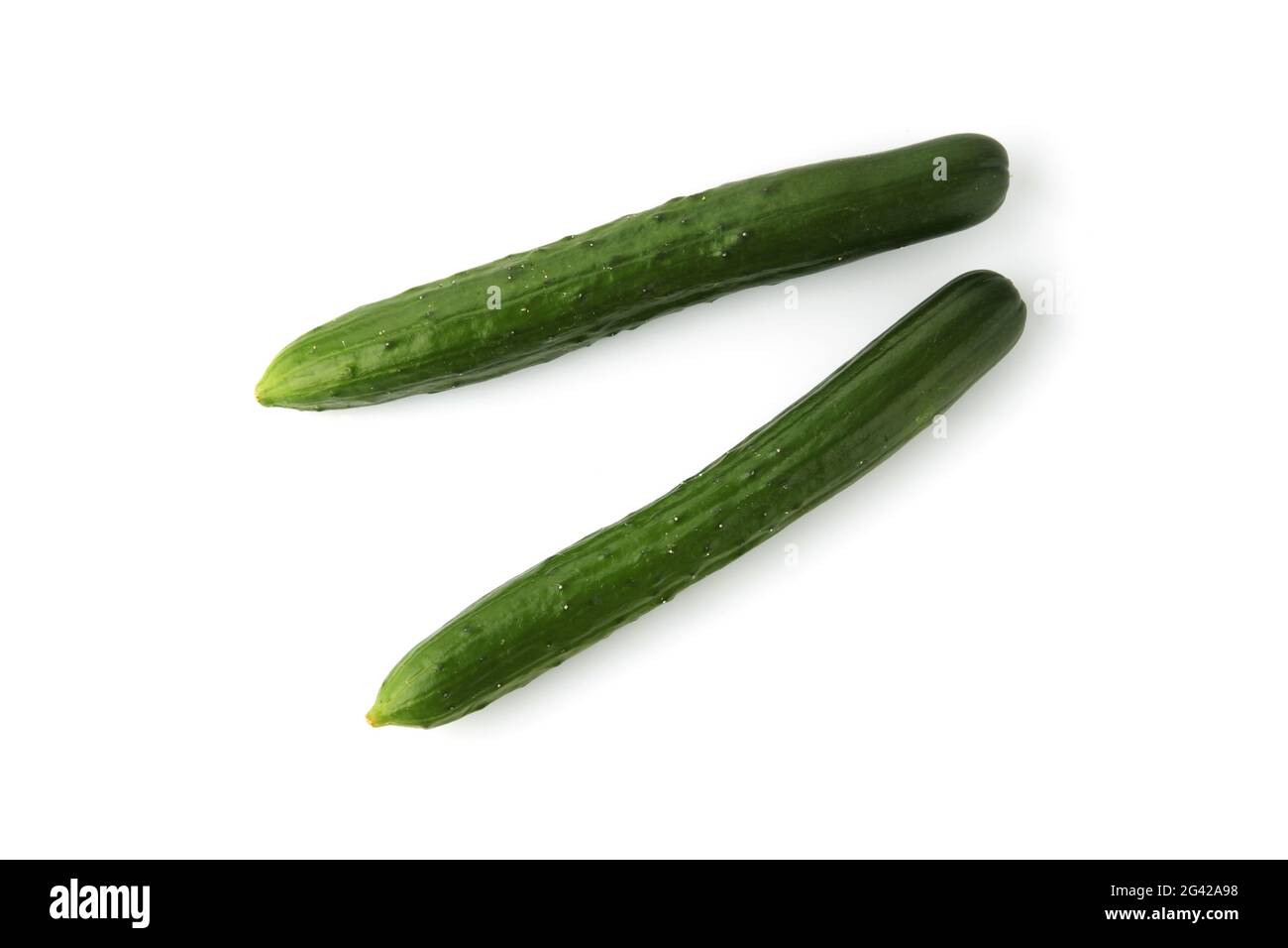 green cucumbers isolated on white background Stock Photo - Alamy