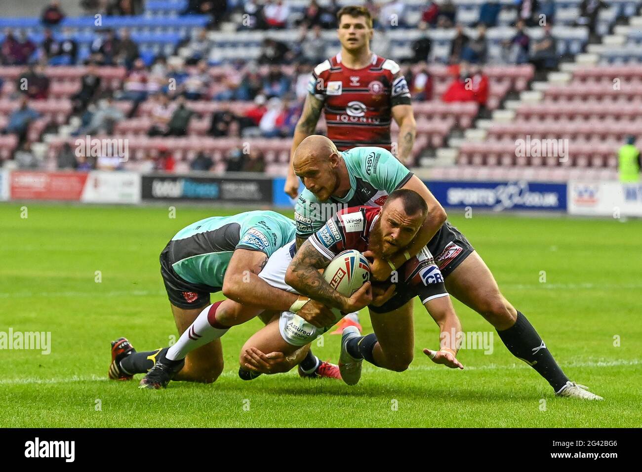 Wigan, UK. 18th June, 2021. Jake Bibby (22) of Wigan Warriors is ...