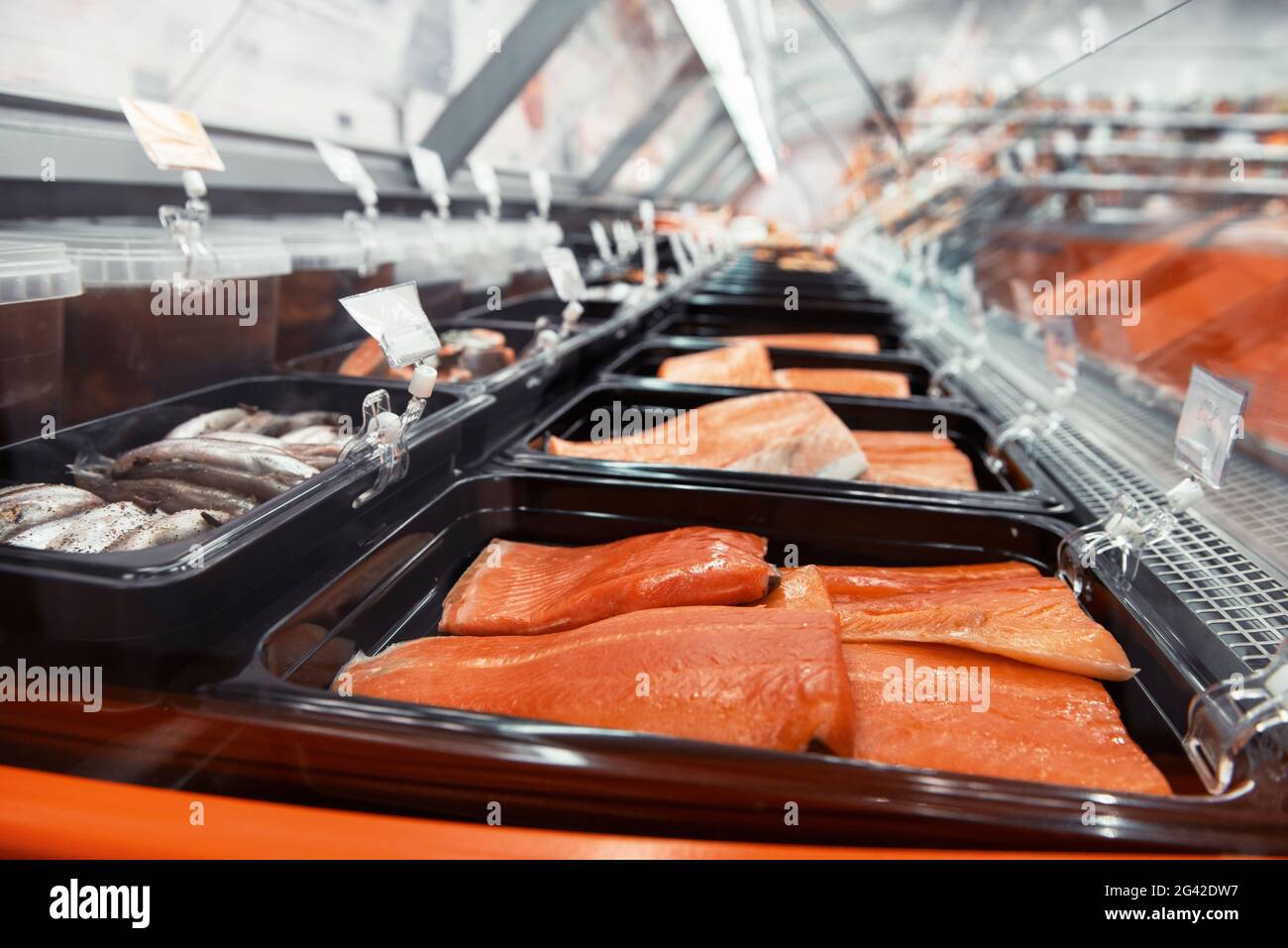 Fish and seafood stall in a market Stock Photo - Alamy