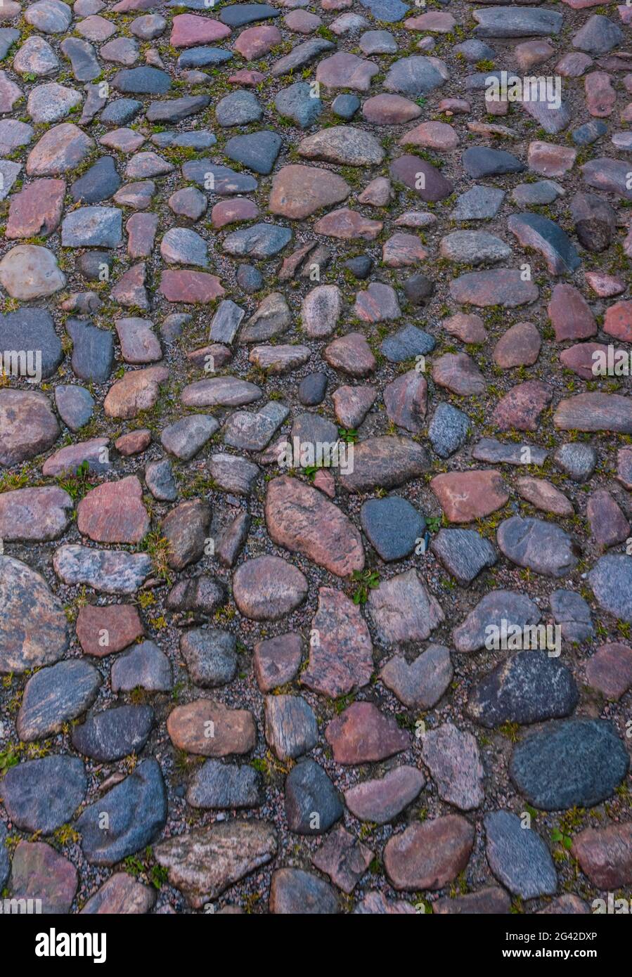 Rough cobblestone in multiple colors Stock Photo - Alamy
