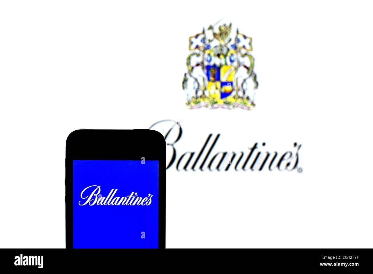 In this photo illustration a Ballantine's logo seen displayed on a ...