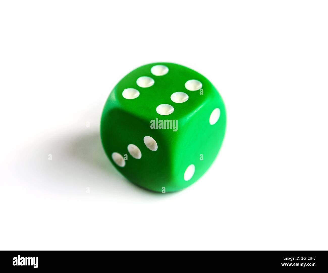 Green dice isolated on white background Stock Photo - Alamy
