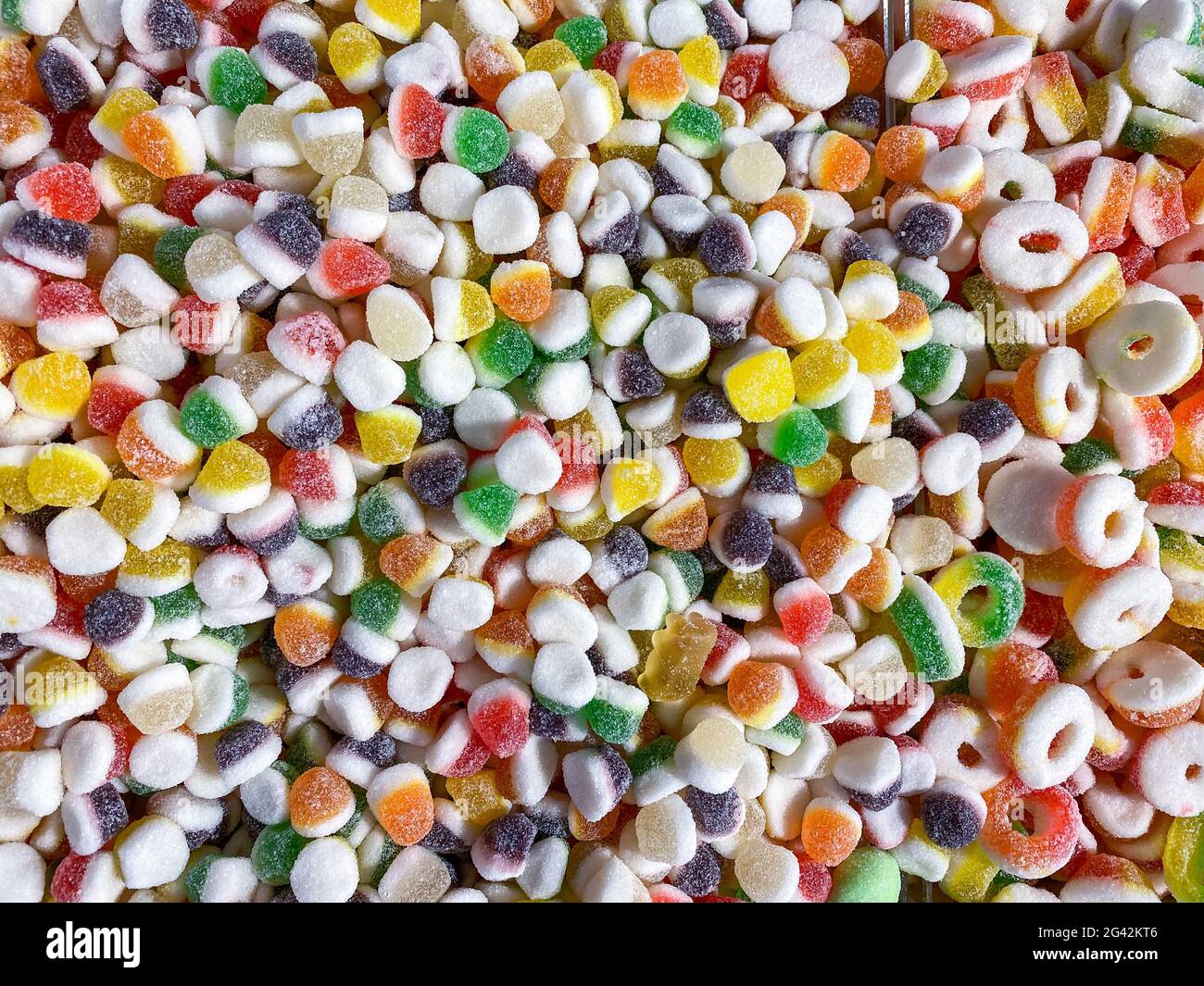 Closeup a background from colorful sweets of sugar candies. Assortment ...