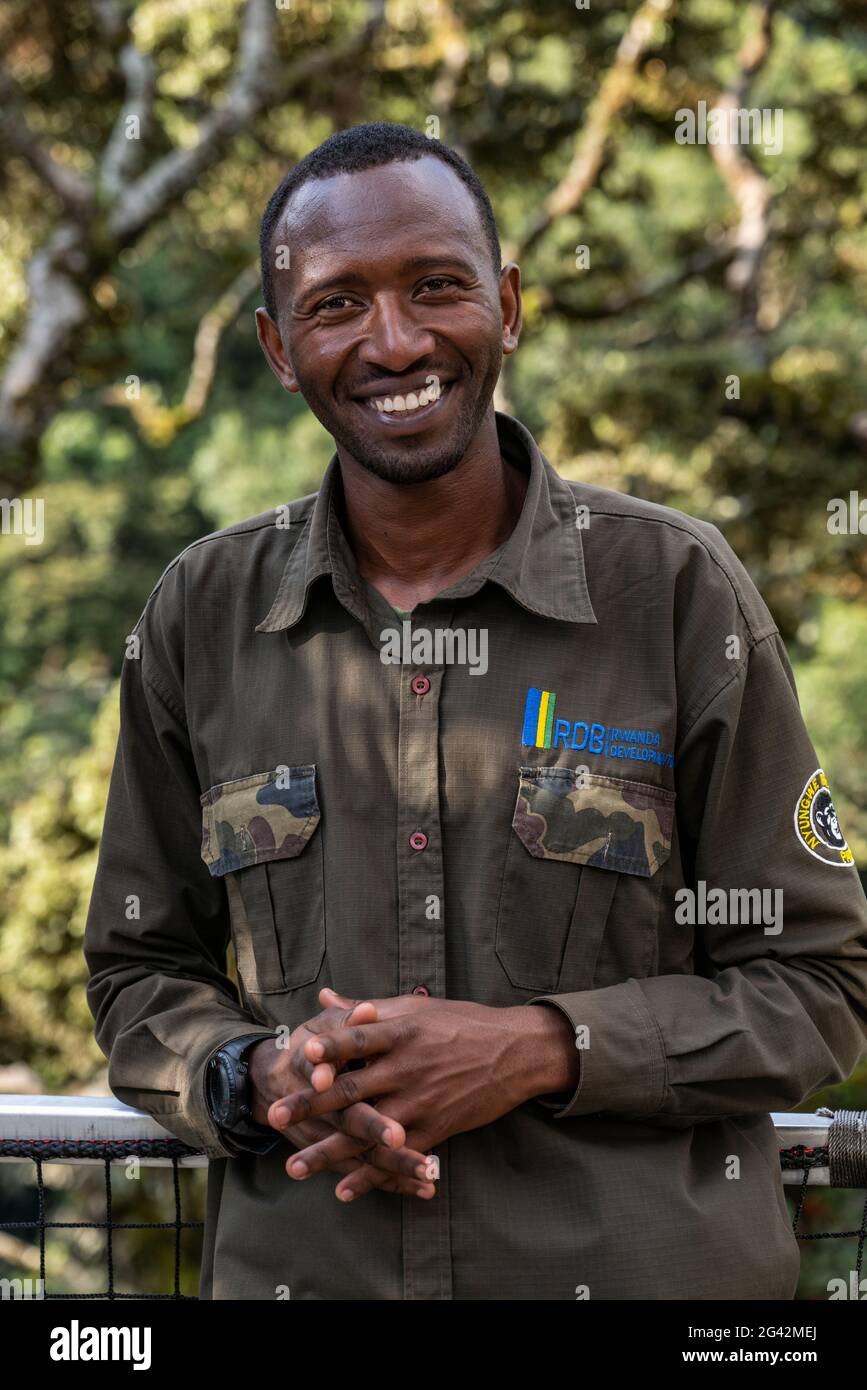 Smiling ranger guide on Canopy Walkway, Nyungwe Forest National Park ...