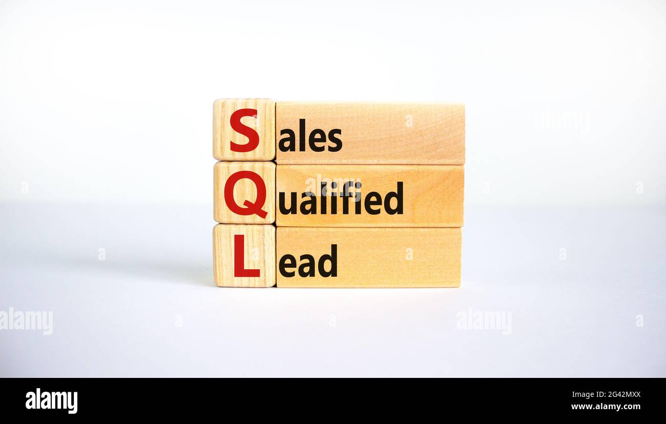 SQL sales qualified lead symbol. Wooden blocks with words 'SQL sales ...