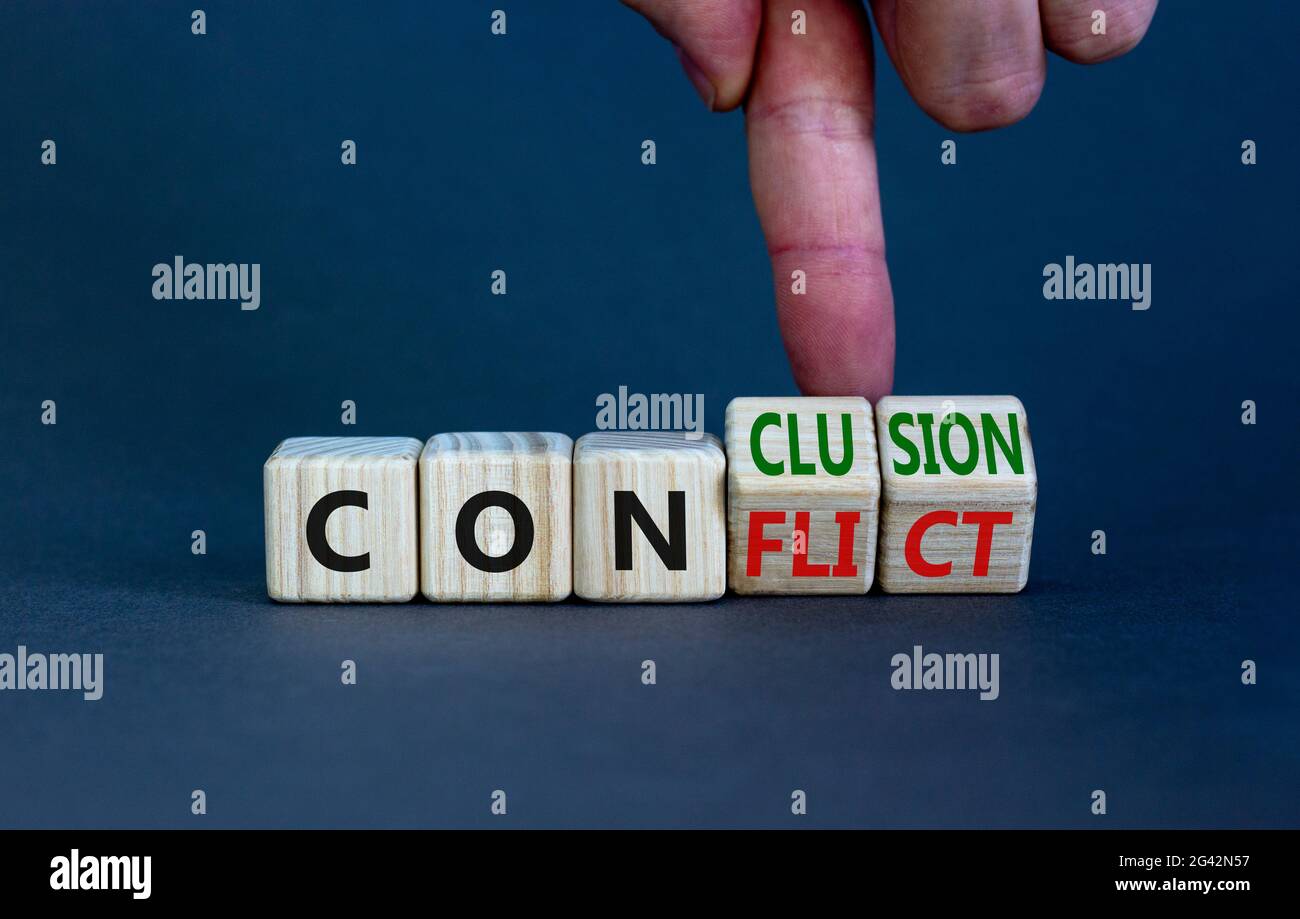 Conflict or conclusion symbol. Businessman turns wooden cubes, changes ...