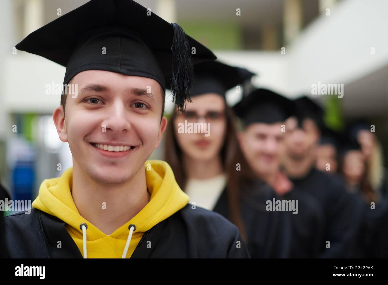 Joyful graduates celebrating success hi-res stock photography and ...