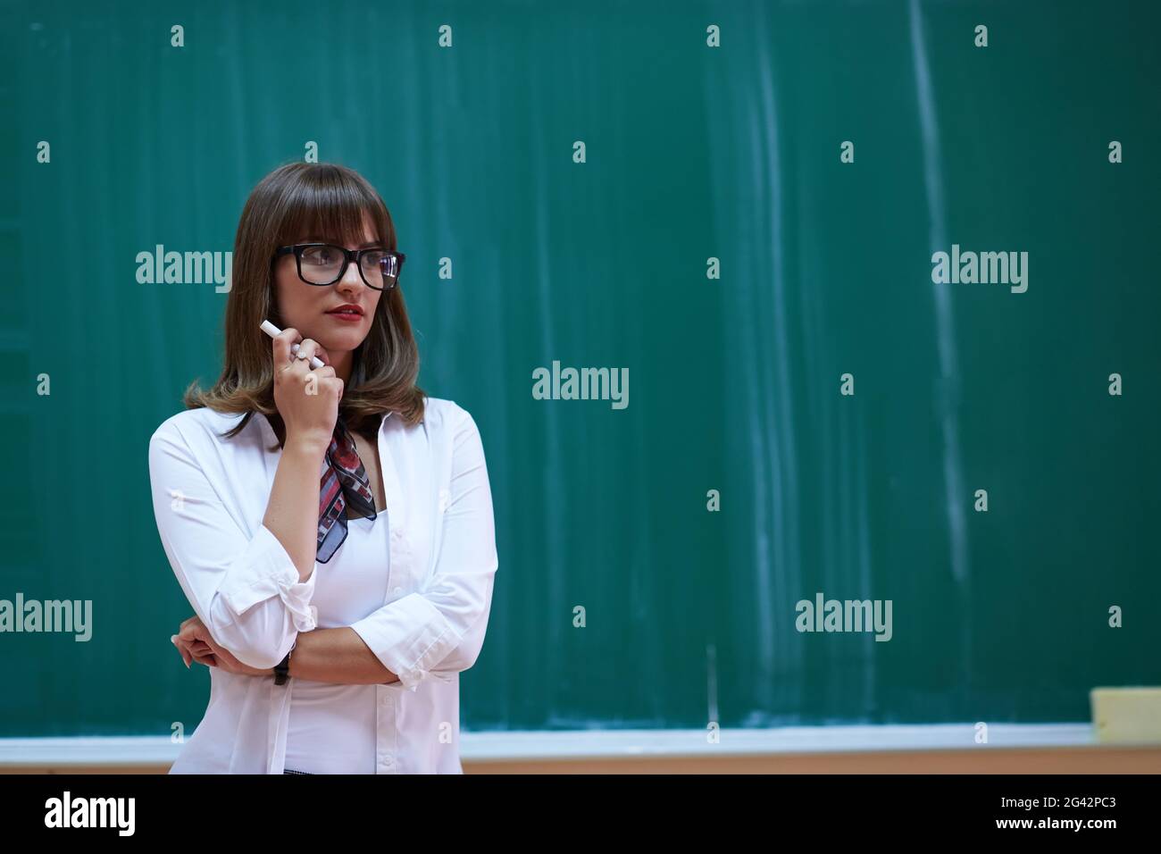 The professor explains the task on the board Stock Photo - Alamy