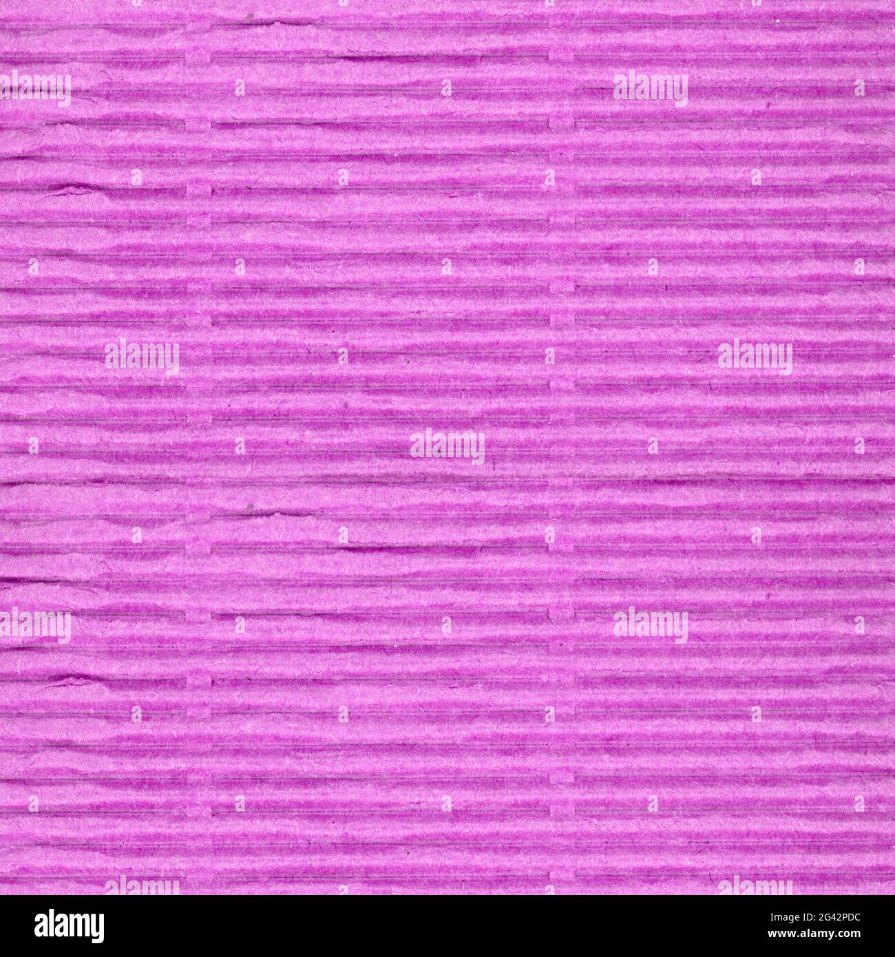 pink corrugated cardboard texture useful as a background Stock Photo ...