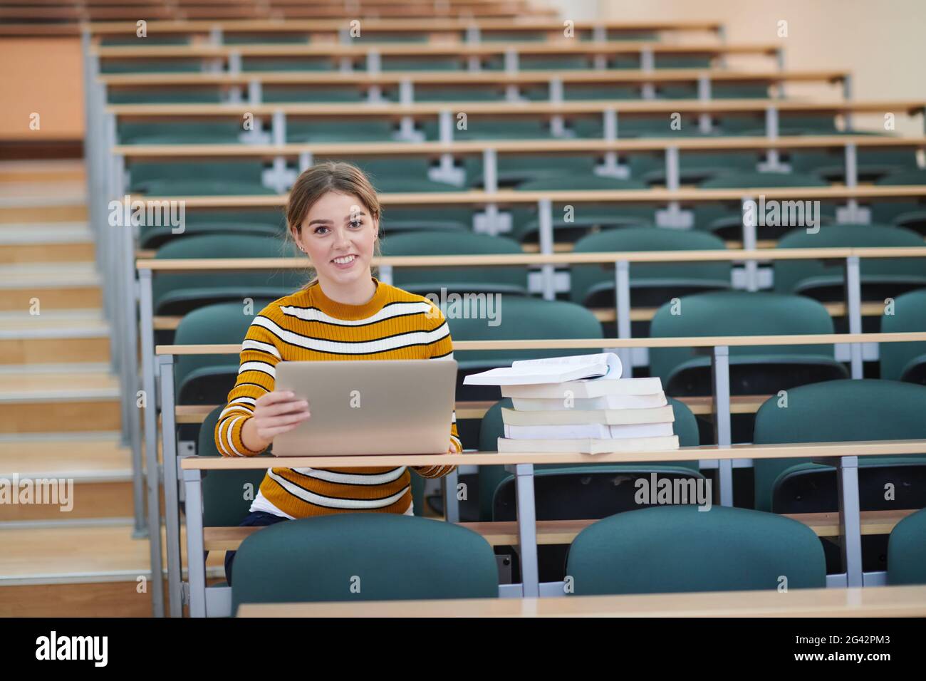 Student taking notes for school class Stock Photo - Alamy
