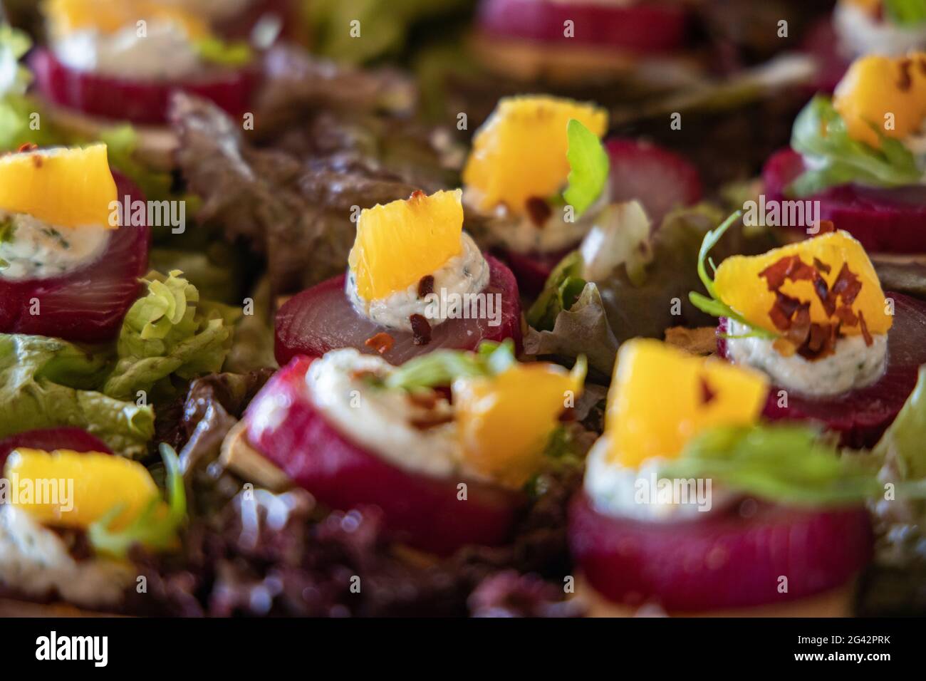 Delicious canapes are served during a cocktail mixology event in a ...