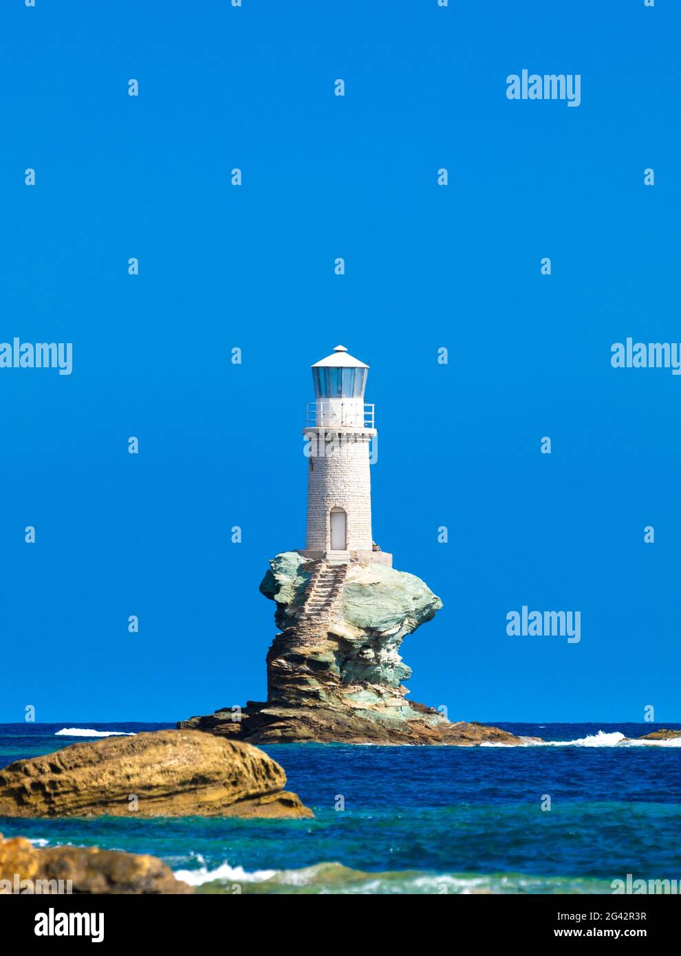 The beautiful Lighthouse Tourlitis of Chora at night. Andros island ...