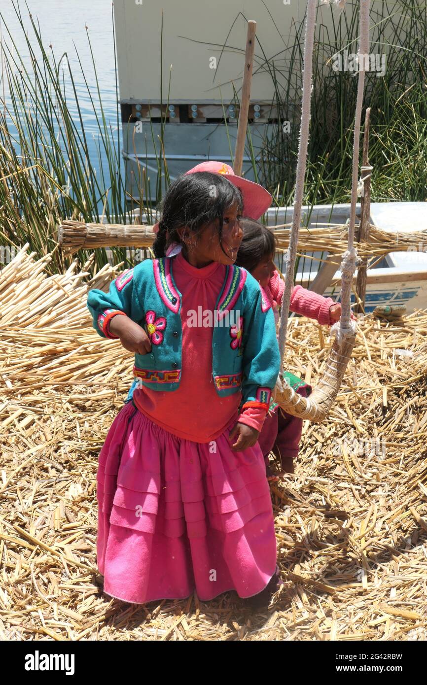 Children at School play time in Lake Titicaca on a floating island Peru ...