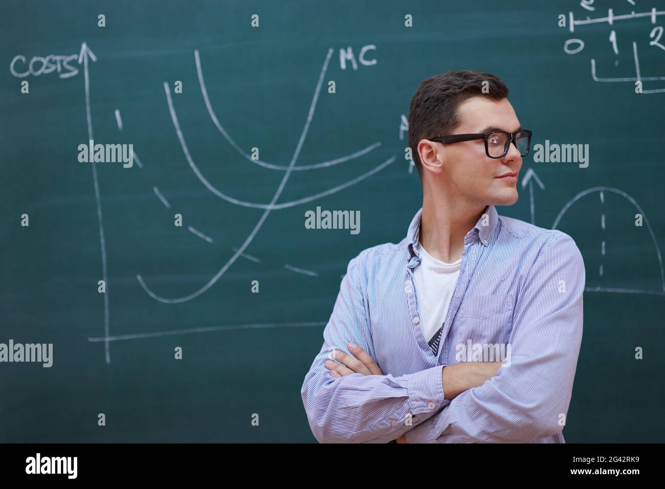 The student does the task on the board Stock Photo - Alamy