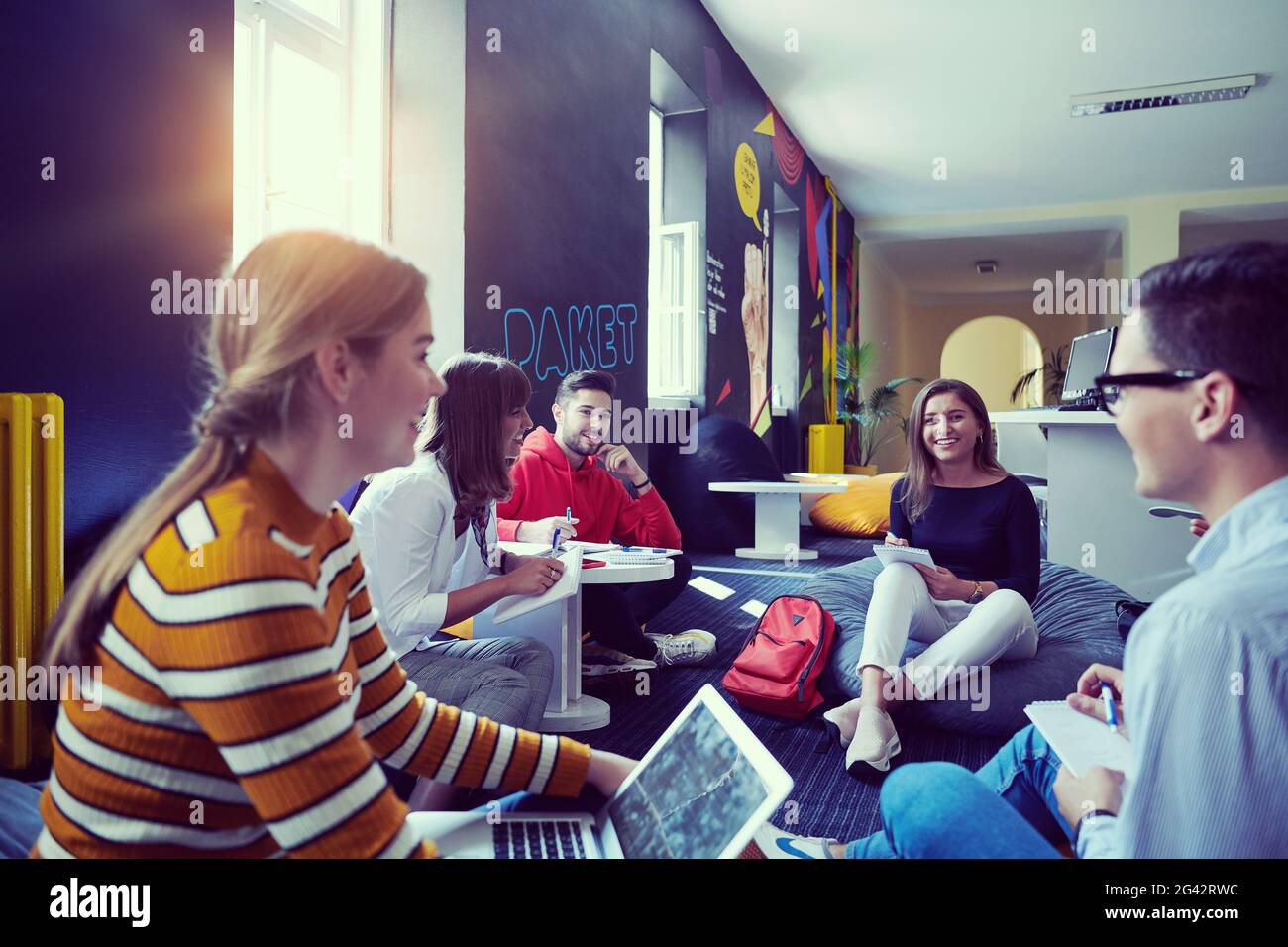 Students using modern technology for school project Stock Photo - Alamy