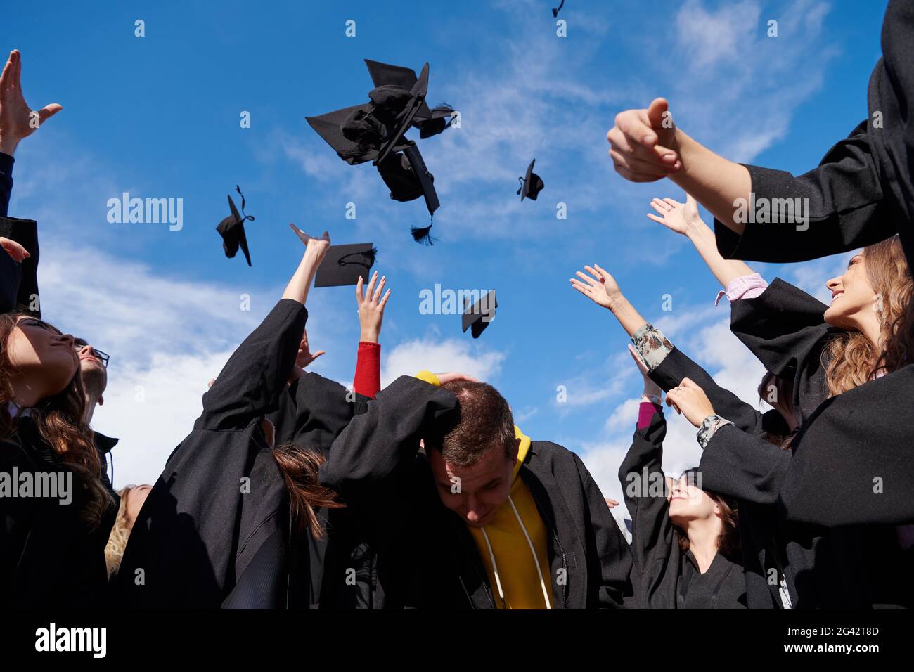 Group of diverse international graduating students celebrating Stock ...