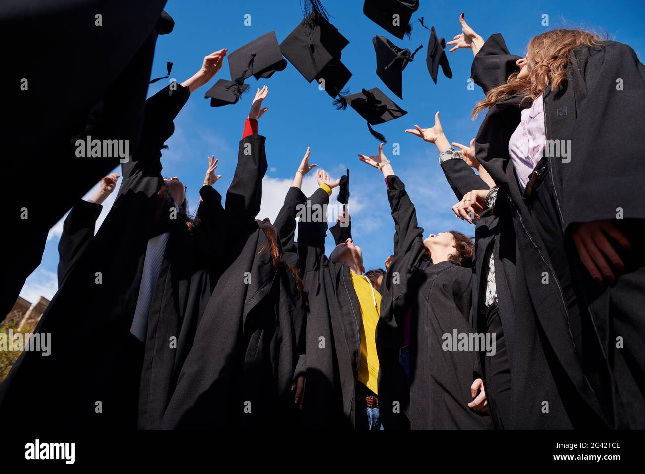 Group diverse students celebrating graduation hi-res stock photography ...