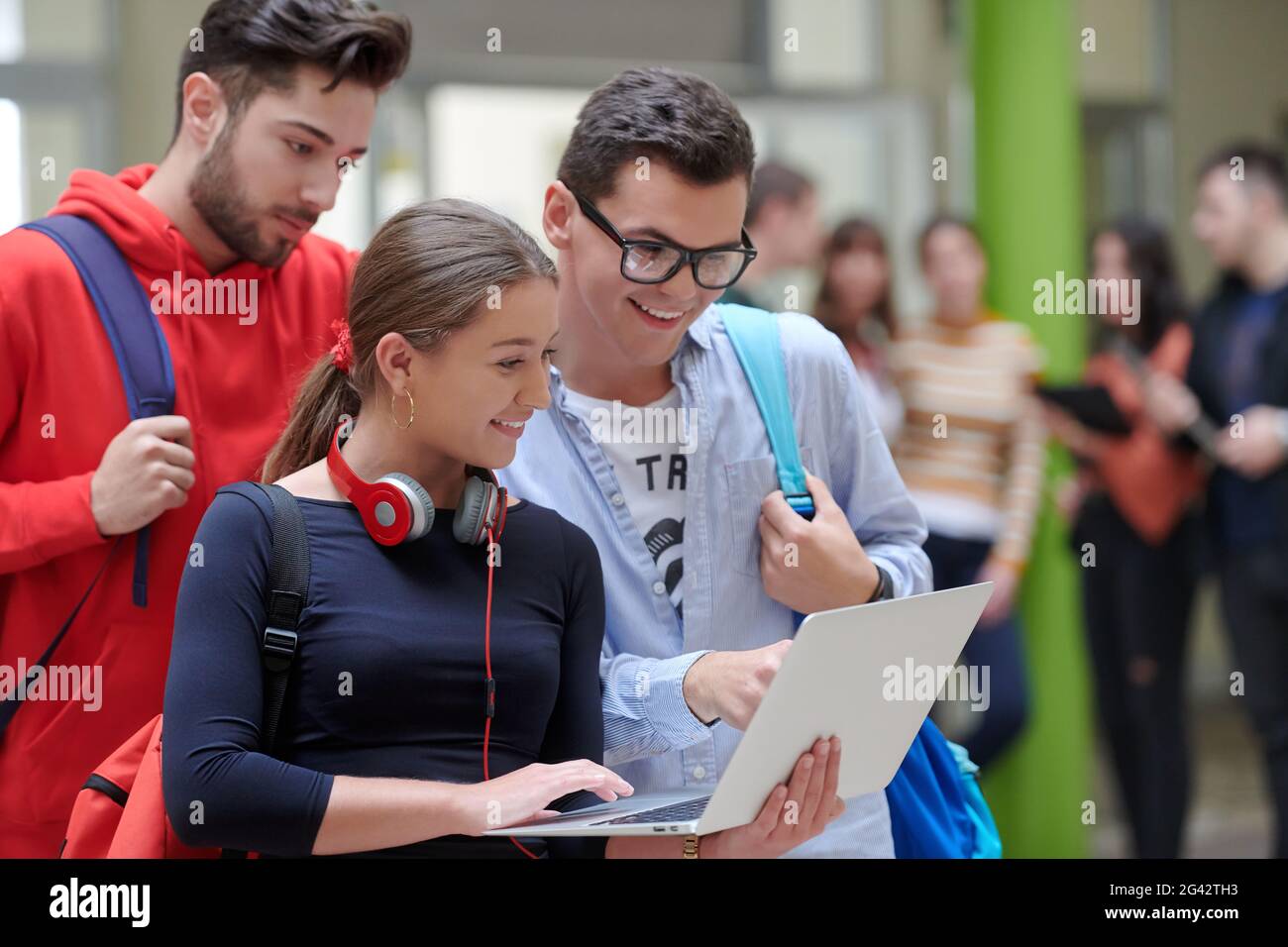 Students using modern technology for school project Stock Photo - Alamy