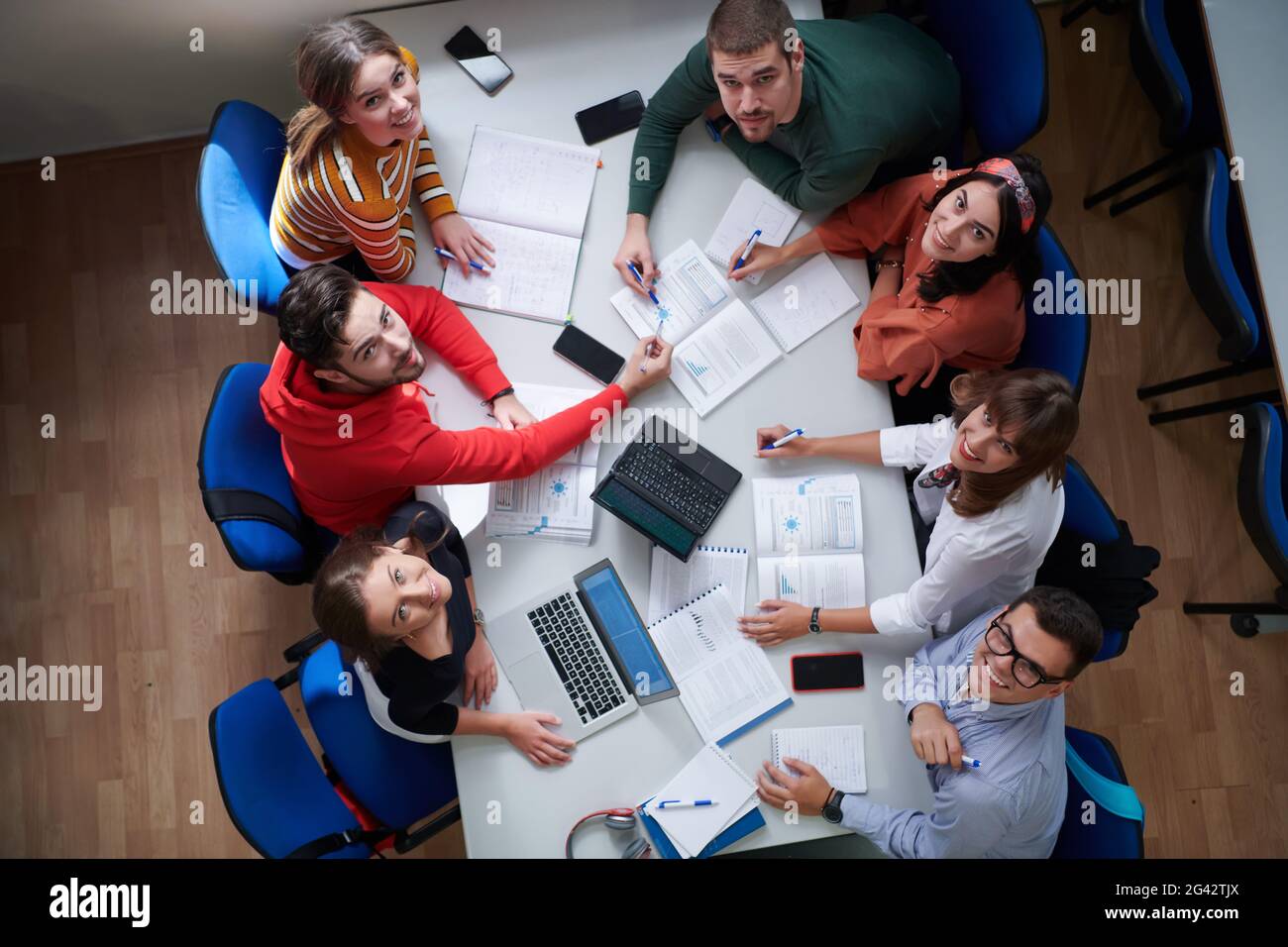 Students use modern technology for a school project Stock Photo - Alamy
