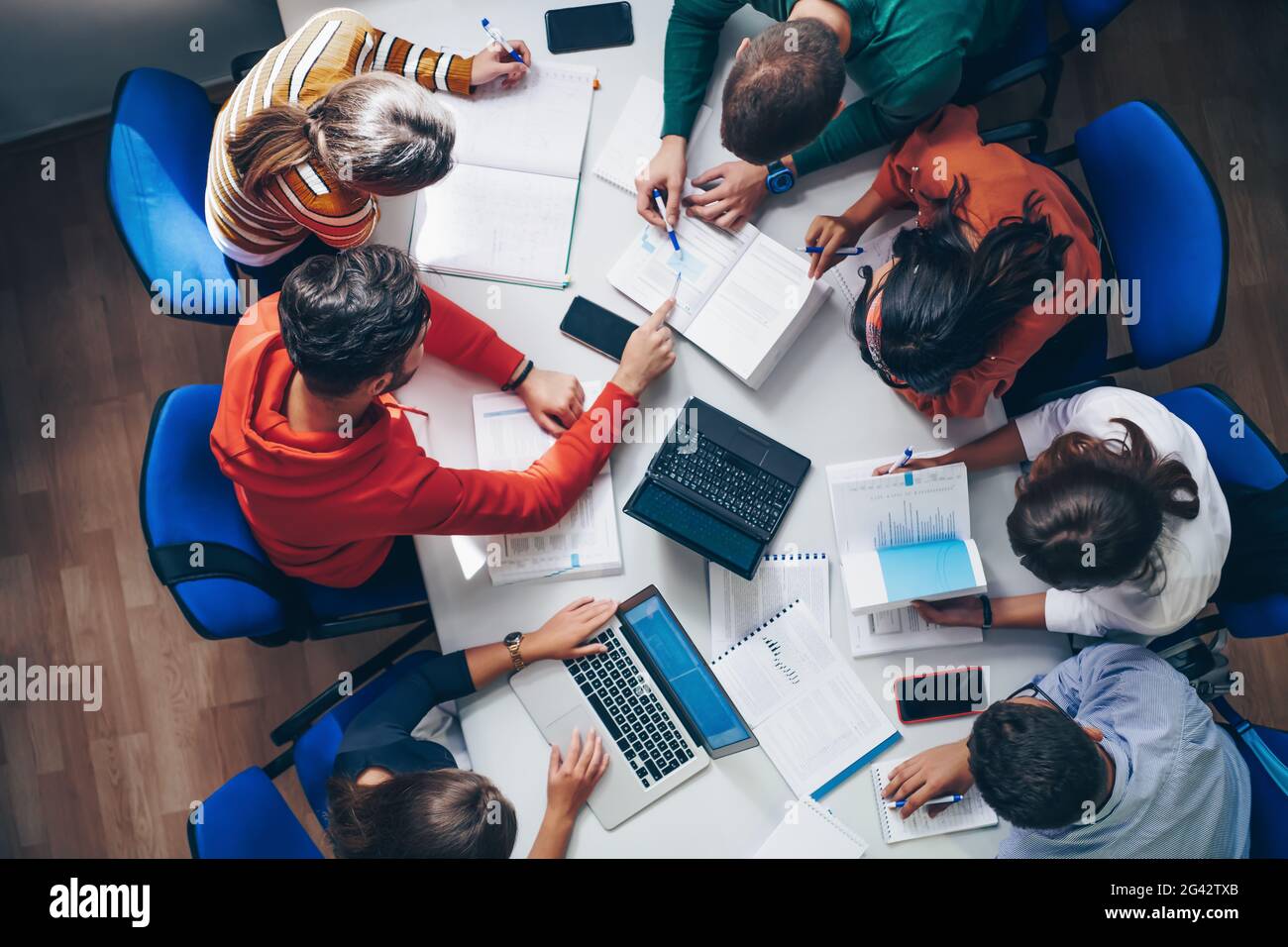 Students use modern technology for a school project Stock Photo - Alamy