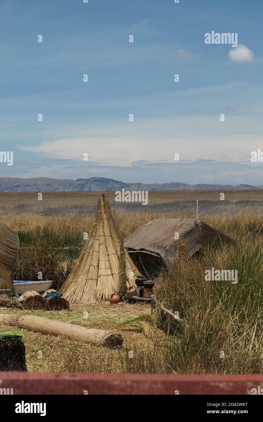 Lake Titicaca Peru type hut huts wood reeds reed sky view views home ...