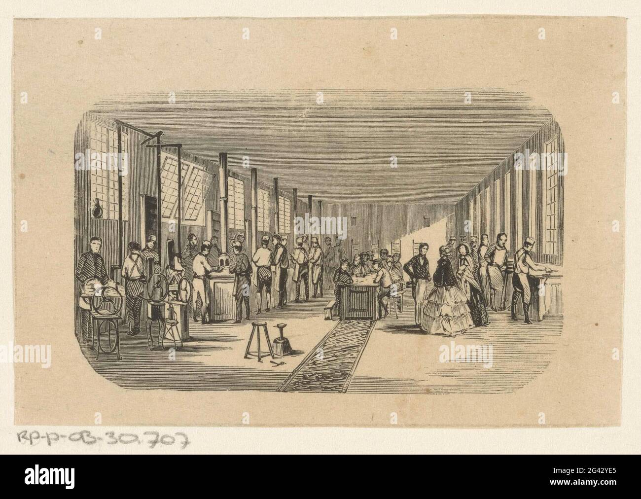 Interior of a workshop with dozens of men at work Stock Photo - Alamy