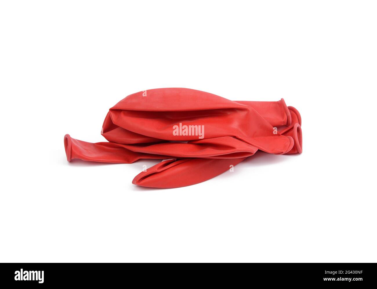Pile of deflated rubber red balls isolated on white background Stock ...