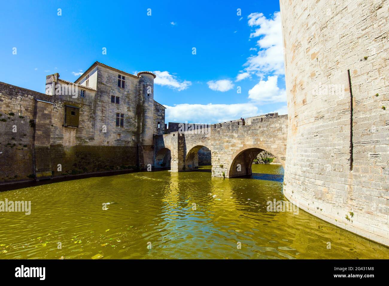 The walls and moat with water Stock Photo - Alamy