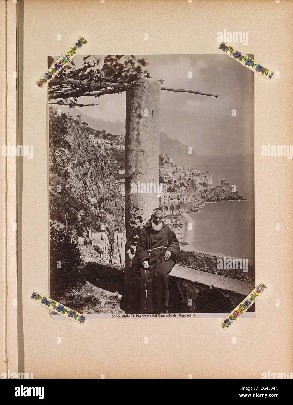 View of Amalfi from a monastery, a capuchin monk in the foreground ...