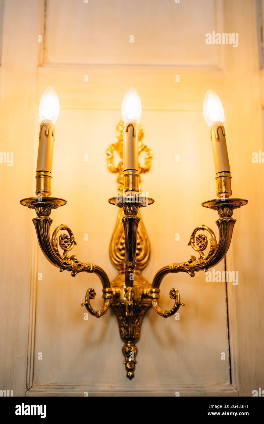 Gold three lamp floor hi-res stock photography and images - Alamy
