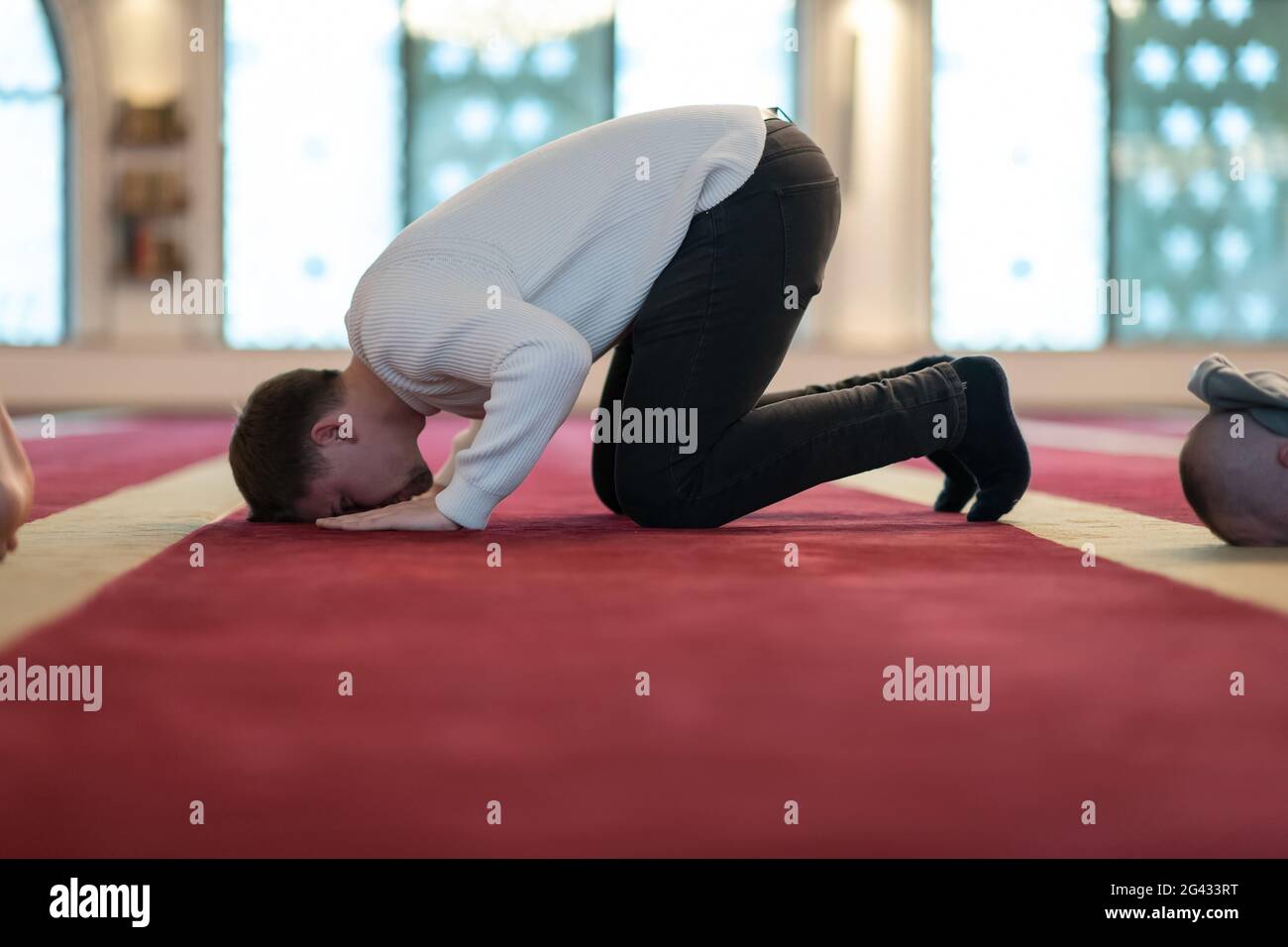 Man performing sajdah in namaz Stock Photo - Alamy