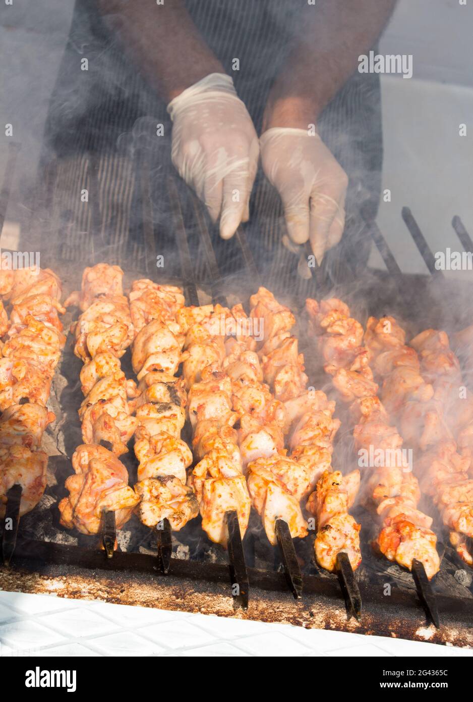 Chicken shashlyk being grilled Stock Photo - Alamy