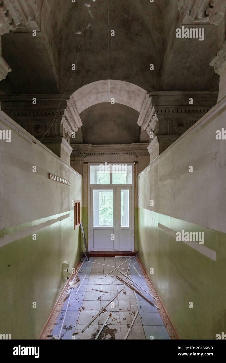 Arched corridor in old abandoned historical building Stock Photo - Alamy