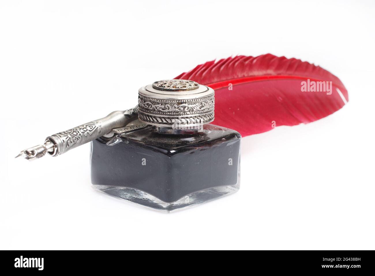 Old vintage red fountain pen with inkwell on white background Stock ...
