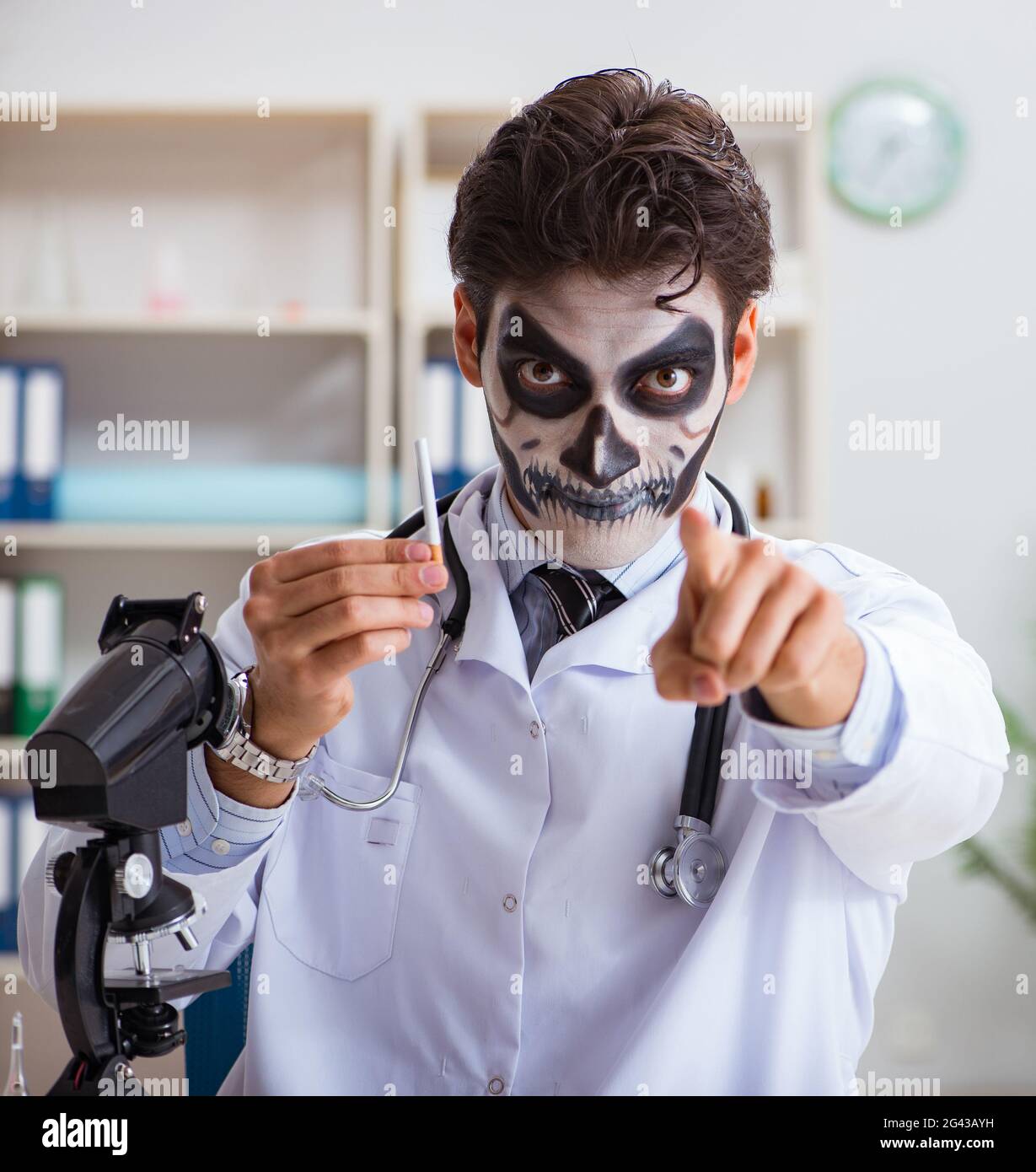 Scary monster doctor working in lab Stock Photo - Alamy