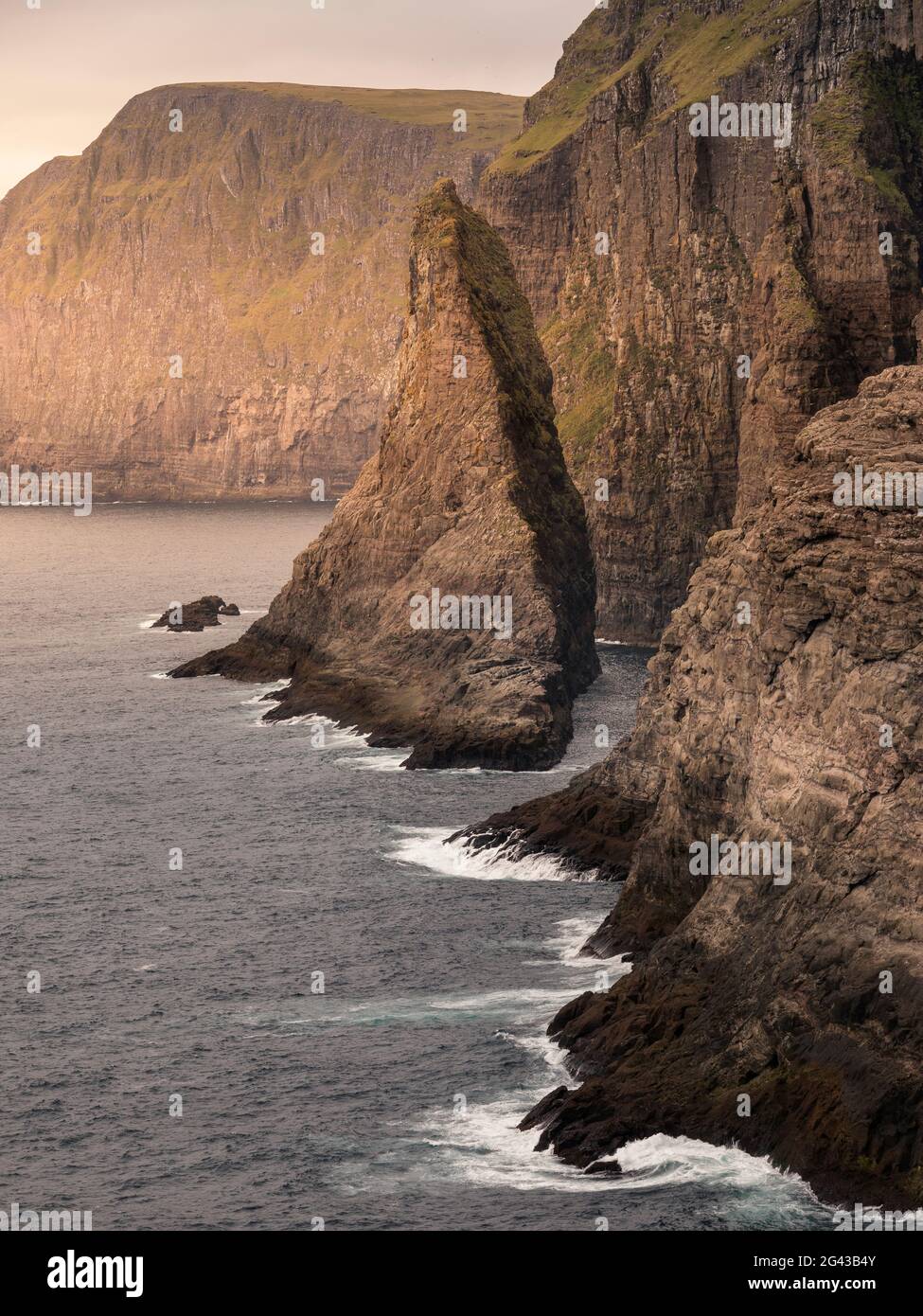Coast and cliffs at Trælanípa on the island of Vagar, on Lake ...